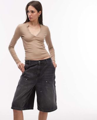 Carhartt Work in Progress Nixon - Weite Shorts in Schwarz mit doppelter Stofflage im Kniebereich und Abnutzungen