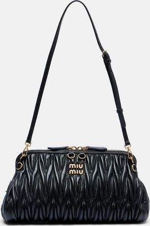 Miu Miu Pochette matelassée en cuir