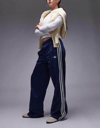 adidas Originals Firebird - Pantalon de surv&ecirc;tement ample - Bleu marine et blanc