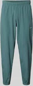 Nike Form Pants mit Logo-Print und Eingriffatschen