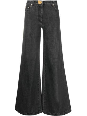Moschino jean &agrave; design &eacute;vas&eacute; - Noir