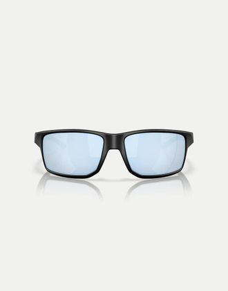 Oakley Gibston XL - Rechteckige, polarisierte Sonnenbrille in Mattschwarz mit verspiegelten blauen Gläsern