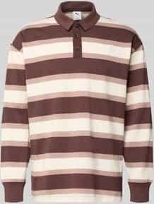 Puma Regular Fit Poloshirt mit elastischen &Auml;rmelabschl&uuml;ssen