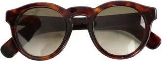 Cutler and Gross Lunettes de soleil marron
