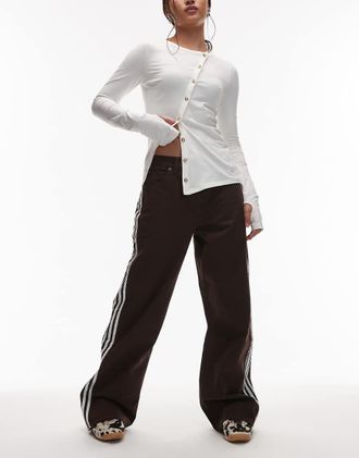 adidas Originals Firebird - Jeans in Braun-Brown