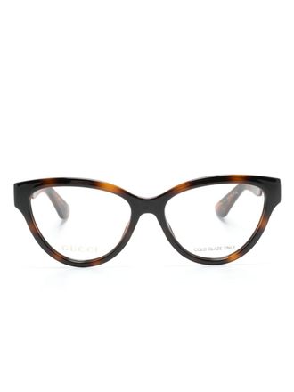 Gucci lunettes de vue à monture papillon - Marron