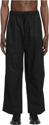 Simone Rocha Homme, Pantalons, Noir, Taille: L Pantalon &agrave; plis aux genoux avec marguerite
