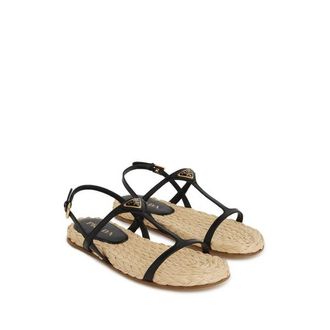 Prada Sandales plates en cuir et raphia