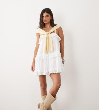 the frolic Exclusivit&eacute; - The Frolic - Robe caraco courte &agrave; volants en plumetis de coton - Blanc