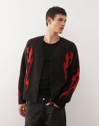 Weekday Oversize-Strickjacke in Schwarz mit Flammen-Grafik
