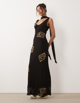Never Fully Dressed Simona - Robe longue sans manches orn&eacute;e de sequins avec encolure d&eacute;gag&eacute;e style foulard - Noir