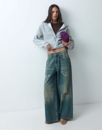 Collusion X007 XL Baggy-Jeans mit verstellbarer niedriger Leibh&ouml;he in Grunge-Waschung-Gr&uuml;n