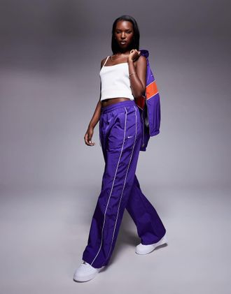 Nike Windrunner - Pantalon de survêtement tissé - Violet