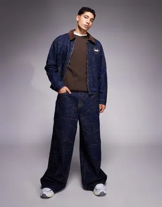 True Religion Mikey - Super Baggy-Jeans in dunkelblauer Waschung mit Pattentaschen und Stickerei, Kombiteil