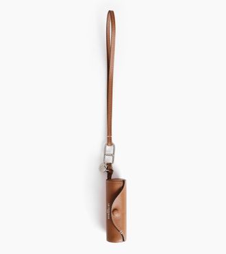 Le Tanneur Etui rouge &agrave; l&egrave;vre charms en cuir grain&eacute;
