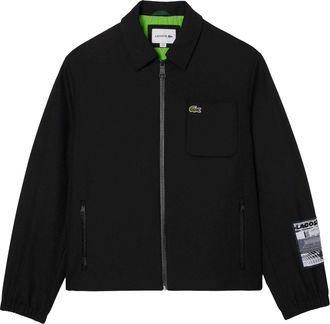 Lacoste Trainingsjacke f&uuml;r Herren, Kostrastfarbenes Futter (Schwarz)