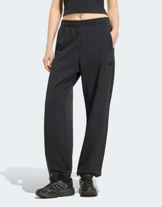 adidas adidas Performance - Pantalon ample avec taille resserr&eacute;e et petit logo - Noir