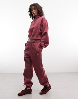Nike Studio Fleece jogger oversize mi-&eacute;pais &agrave; revers rose