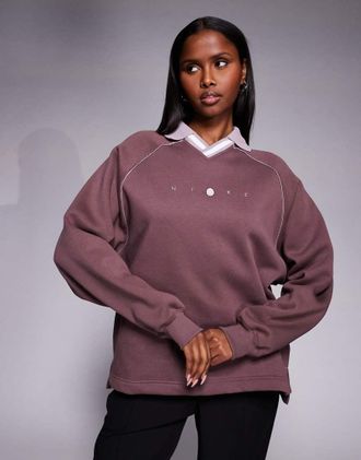 Nike Phoenix Fleece - Oversize-Polohemd in Dunkellila-Brown