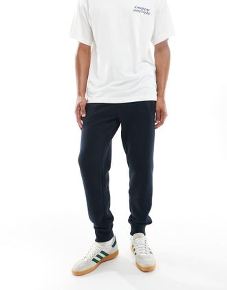Superdry Essential - Jogginghose in Eclipse-Marineblau mit Logo und angerauter Innenseite