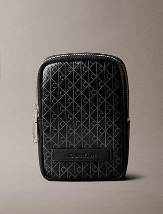 Calvin Klein Pochette zippée entièrement imprimée de logos monogrammes
