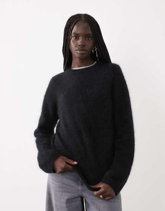 Asos Pullover mit Rundhalsausschnitt, lockerer Passform, aus 100 % Wolle, geb&uuml;rstet, in Schwarz