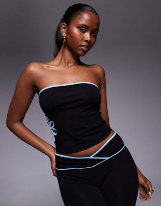 I.AM.GIA Daisy - Schlaghose aus Baumwollmix in Schwarz und Babyblau mit floralem, kontrastierendem Cut-out, Kombiteil