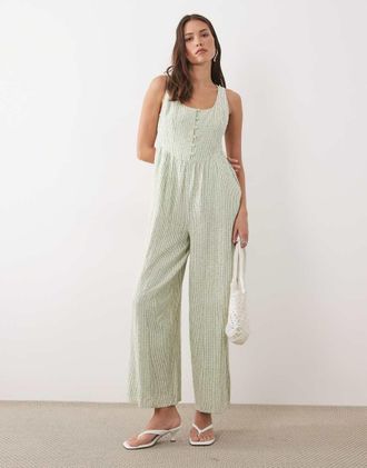 Nobody's Child Cora - Combinaison boutonn&eacute;e sans manches en lin m&eacute;lang&eacute; &agrave; fines rayures - Vert
