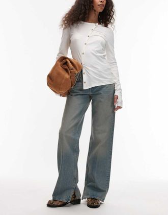 & Other Stories Ausgestellte Bootcut-Jeans in hellblauer Waschung