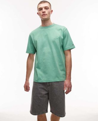 Tommy Hilfiger T-Shirt in Blassgrün mit farblich abgestimmtem Logo