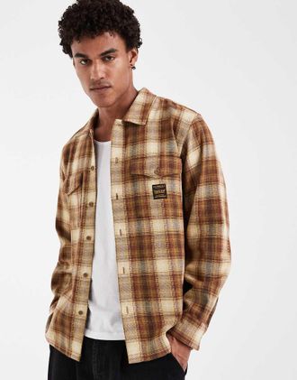 Levi's chemise de travail &agrave; poche &agrave; carreaux marron