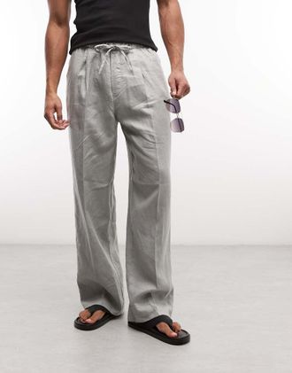 Weekday Leinenhose zum Hineinschl&uuml;pfen in Salbeigr&uuml;n, exklusiv bei ASOS