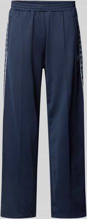 Review Trainingshose mit Biese, aufgesetztem Band und Logo-Bestickung