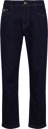 Versace HOSEN & R&Ouml;CKE - Jeanshosen auf YOOX.COM