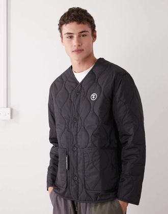 Aape By A Bathing Ape AAPE by A BATHING APE x Alpha Industries - Veste matelassée - Noir