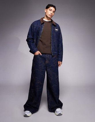 True Religion Mikey - Super Baggy-Jeans in dunkelblauer Waschung mit Pattentaschen und Stickerei, Kombiteil