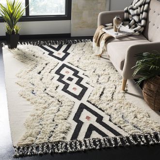 Safavieh Boho Teppich f&uuml;r Wohnzimmer, Esszimmer, Schlafzimmer - Kenya Collection, Hoher Flor, Elfenbein und Schwarzblau, 122 X 183 cm
