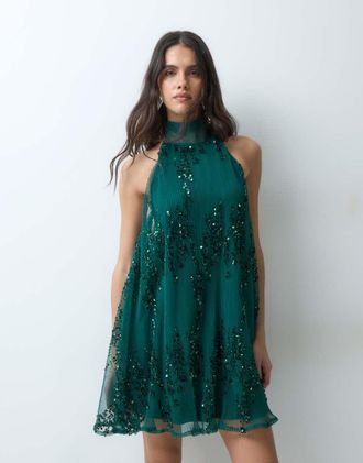 Tfnc robe courte pliss&eacute;e &agrave; sequins et col licou vert &eacute;meraude