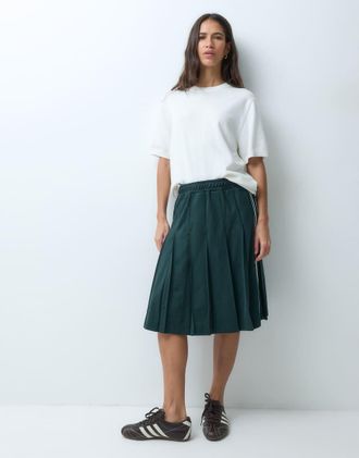 Lacoste jupe midi pliss&eacute;e &agrave; bordure contrastante verte