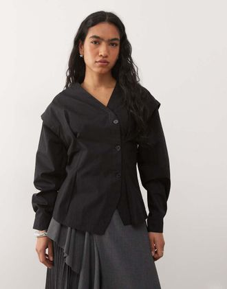 Reclaimed Vintage Chemise boutonn&eacute;e asym&eacute;trique &agrave; empi&egrave;cements - Noir