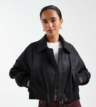 Asos Petite ASOS DESIGN Petite - Bomber oversize en imitation cuir - Noir