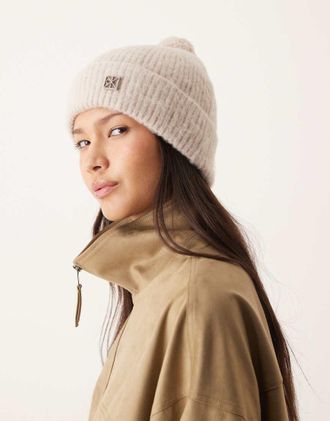 Calvin Klein Bonnet brossé à pompon - Gris