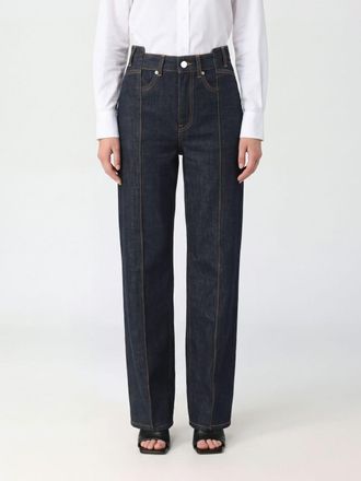 Ganni Jean droit Fold en denim de coton &agrave; taille haute avec logo au dos