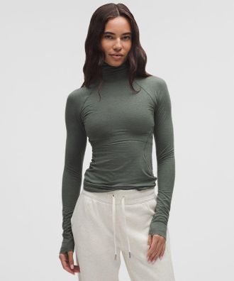 lululemon Baselayer mit Rollkragen aus einer Merino- f&uuml;r Frauen - Wollmischung - Gr&ouml;&szlig;e S in Palm Deco/Rainforest Green