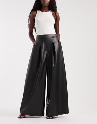 Asos pantalon large ajust&eacute; effet cuir noir craquel&eacute;
