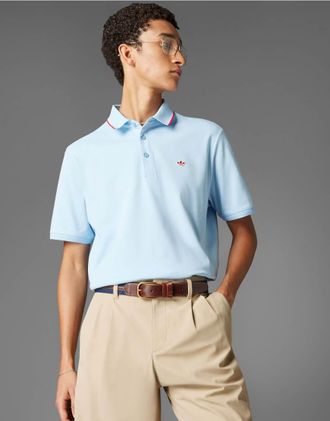 adidas adidas Originals - Twistknit - Polo de golf à logo trèfle - Bleu ciel clair