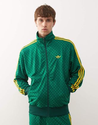 adidas Originals Firebird - Lockere Trainingsjacke in Collegiate Gr&uuml;n mit Monogramm-Muster