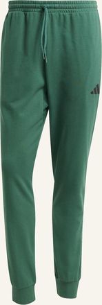 adidas Essentials Feel Cozy French Terry Hose gruen