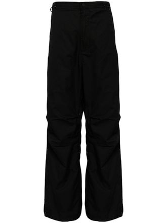 maharishi x Jean-Michel Basquiat pantalon à bretelles - Noir