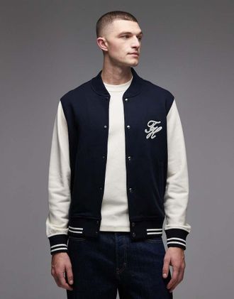 Tommy Hilfiger Jacke in Marineblau mit Farbblockdesign und Schriftzug